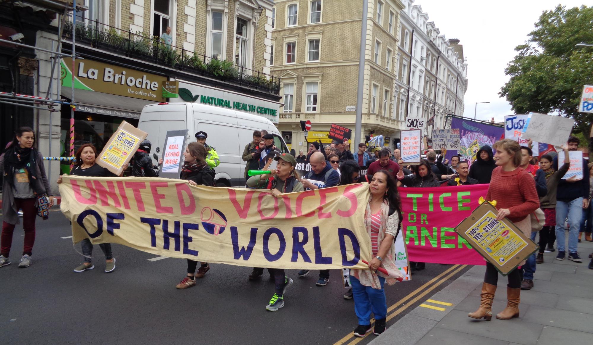 Cleaners at luxury car dealer protest suspensions after strike vote ...